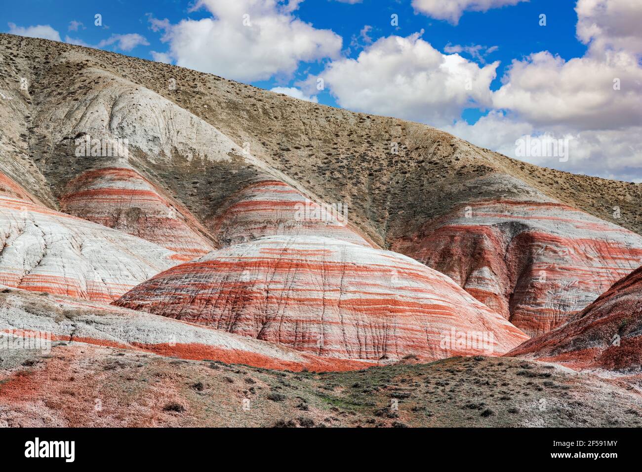 Magnificent striped red mountains landscape Stock Photo - Alamy