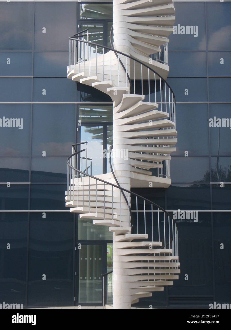 White Spiral Staircase external metal handrail Stock Photo - Alamy
