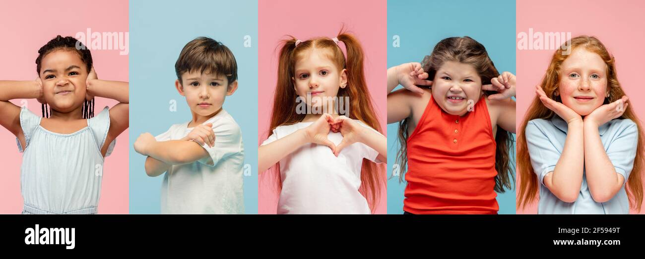 Young and happy kids gesturing isolated on multicolored studio ...