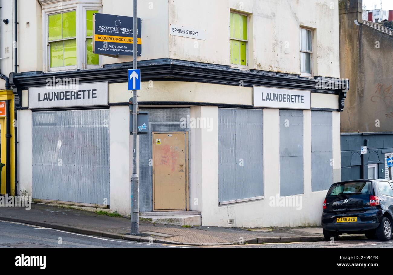 Closed launderette hi-res stock photography and images - Alamy