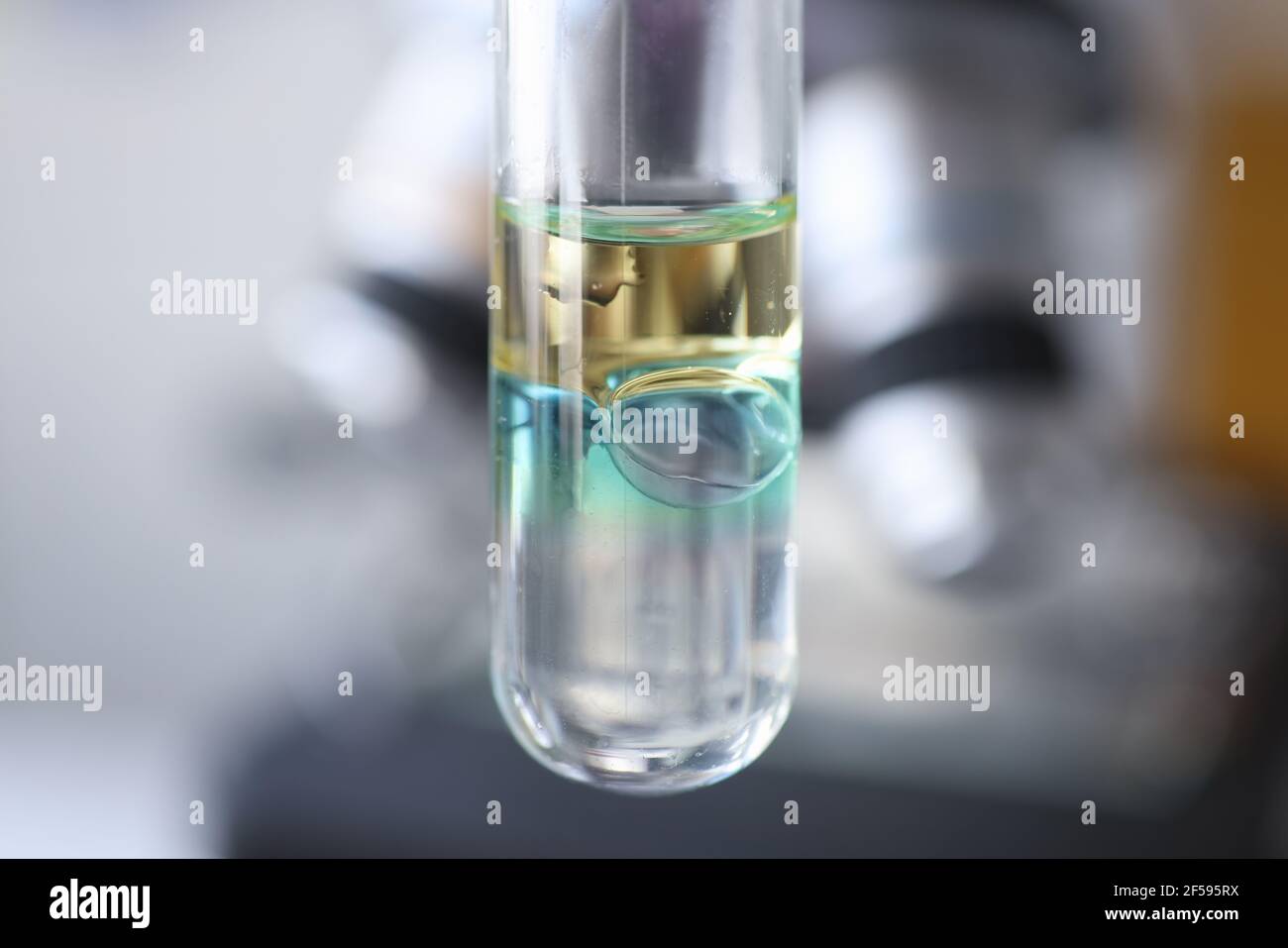 Test tube yellow solution hi-res stock photography and images - Alamy