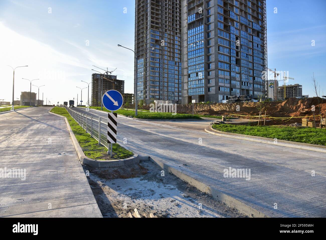 Road works activity at construction site. Construction and development ...