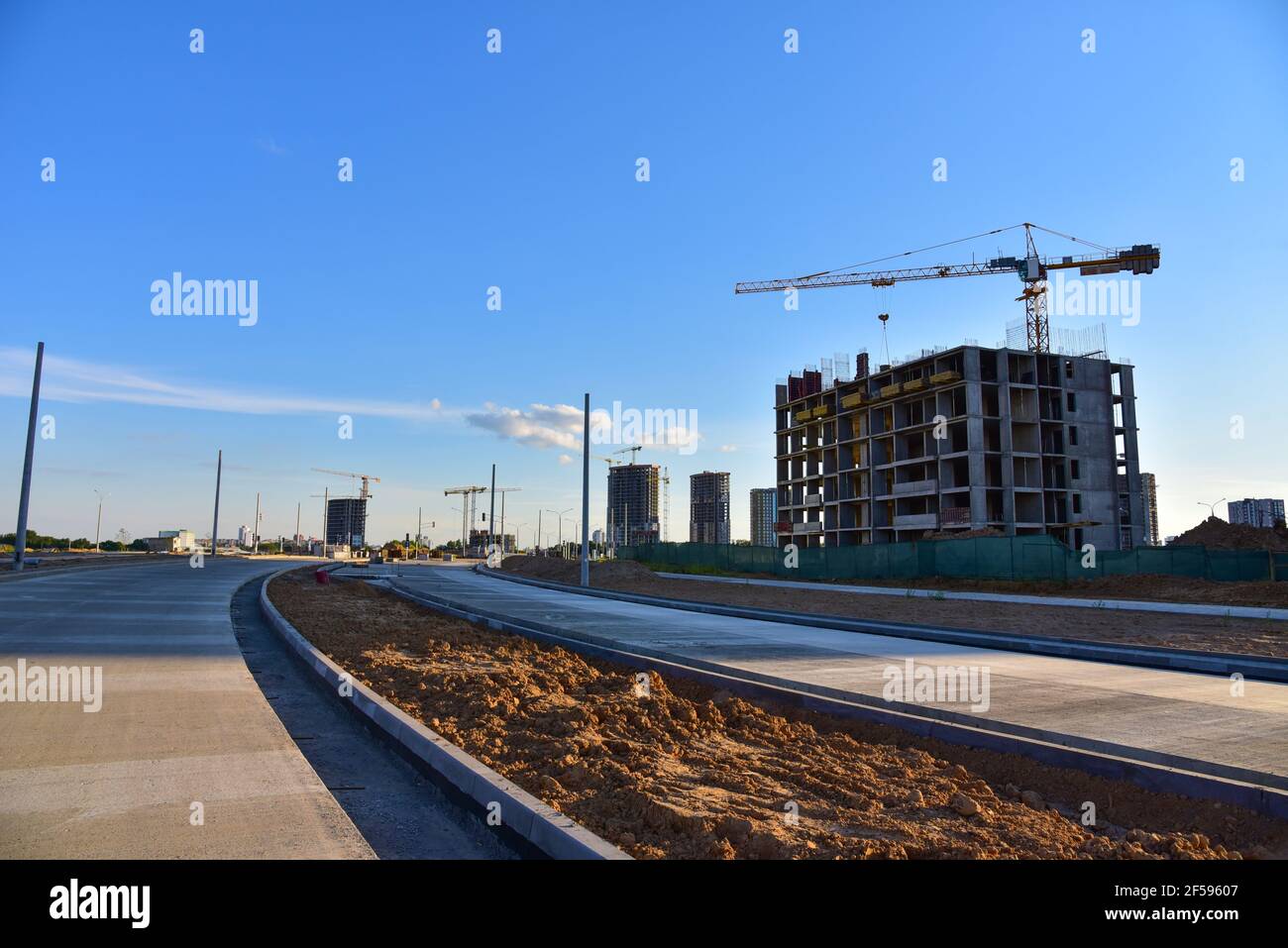 View of a large construction site with tall residential buildings and ...