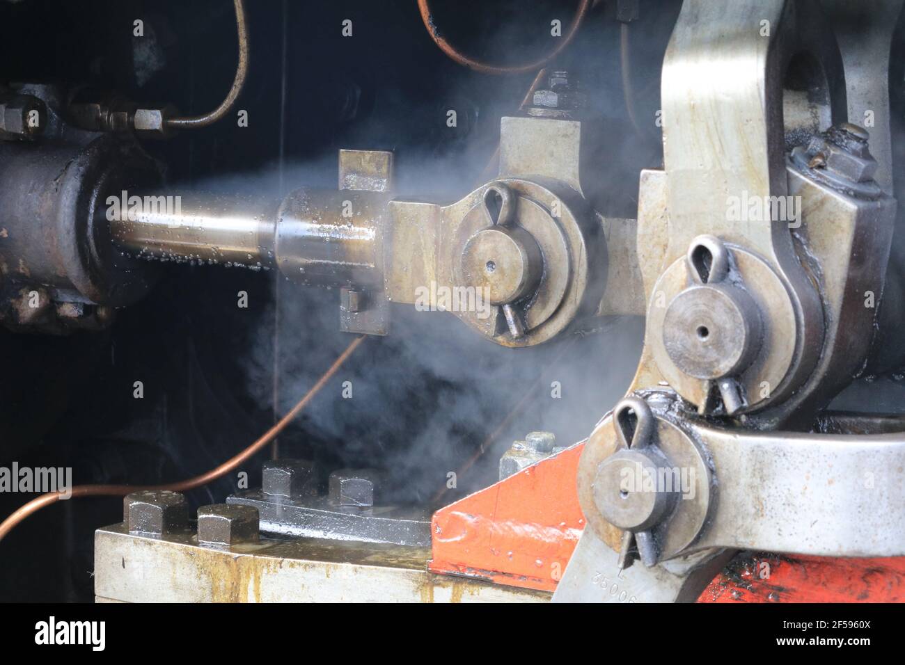 Piston and pipes with steam, locomotive engine Stock Photo - Alamy