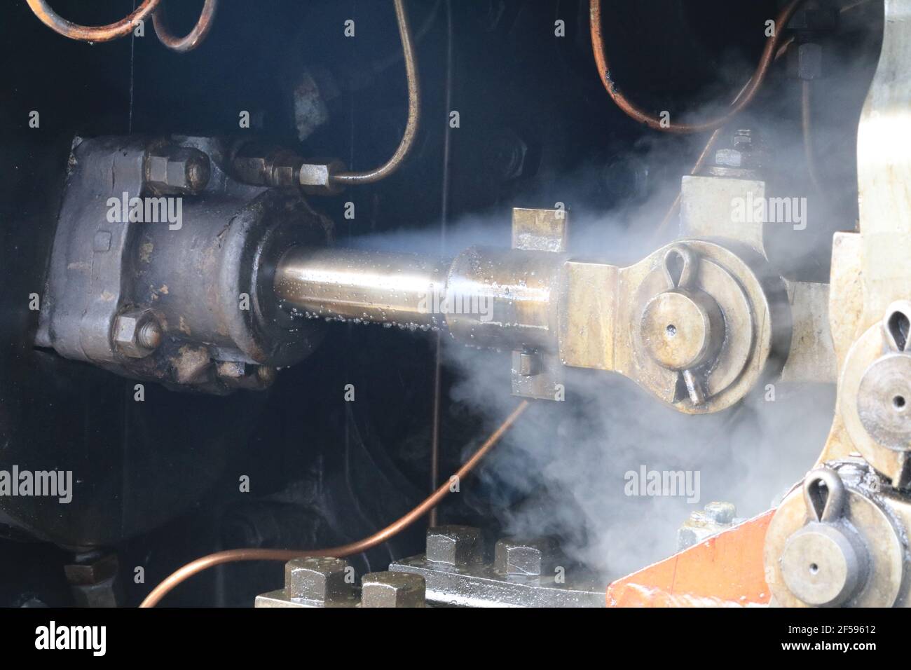 Piston and steam coming out Stock Photo - Alamy