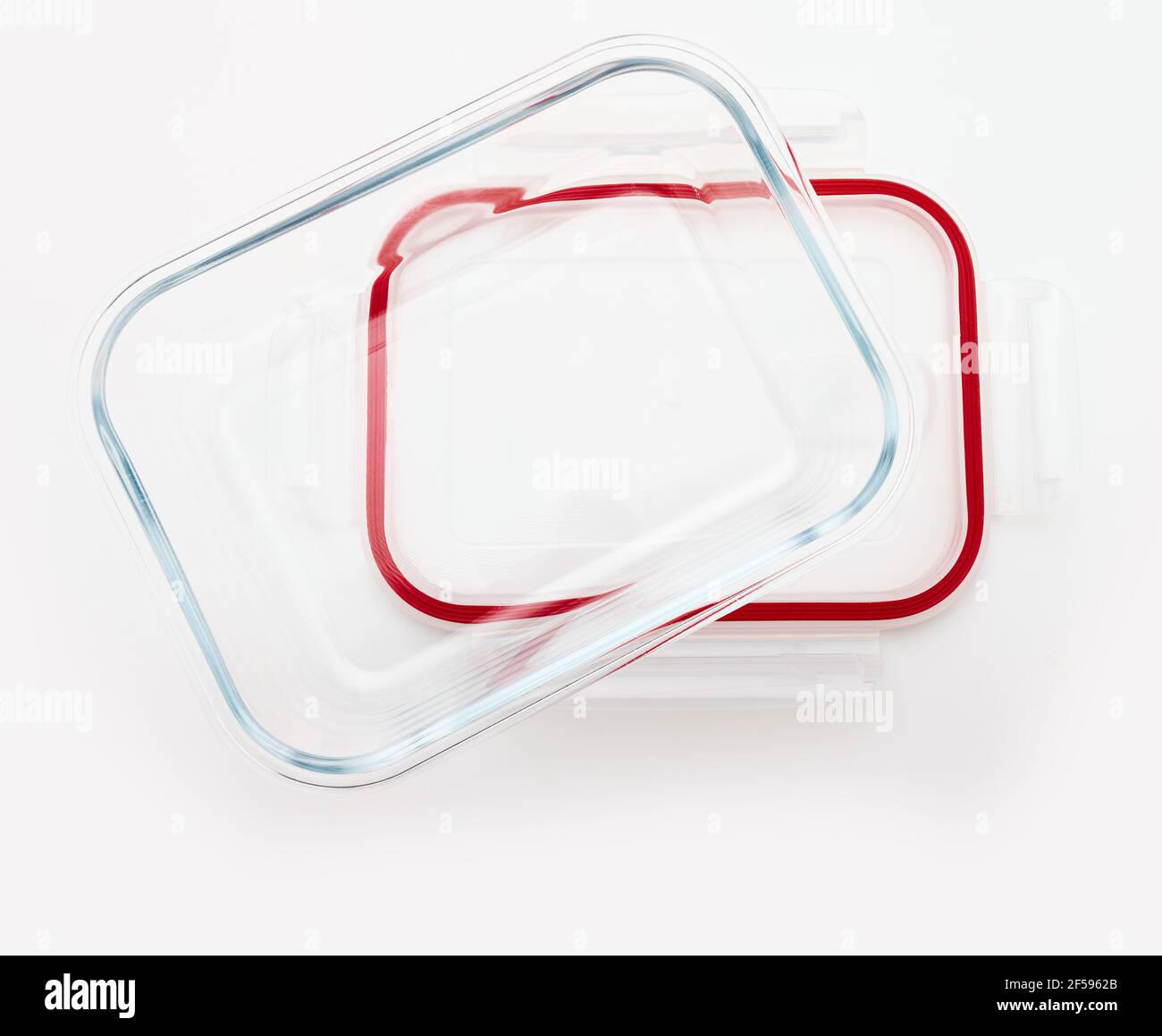 Empty and open glass tupperware. Top view. Isolated on white background ...