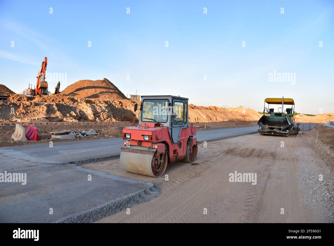 Paving roller machine during road work. Road roller at construction ...