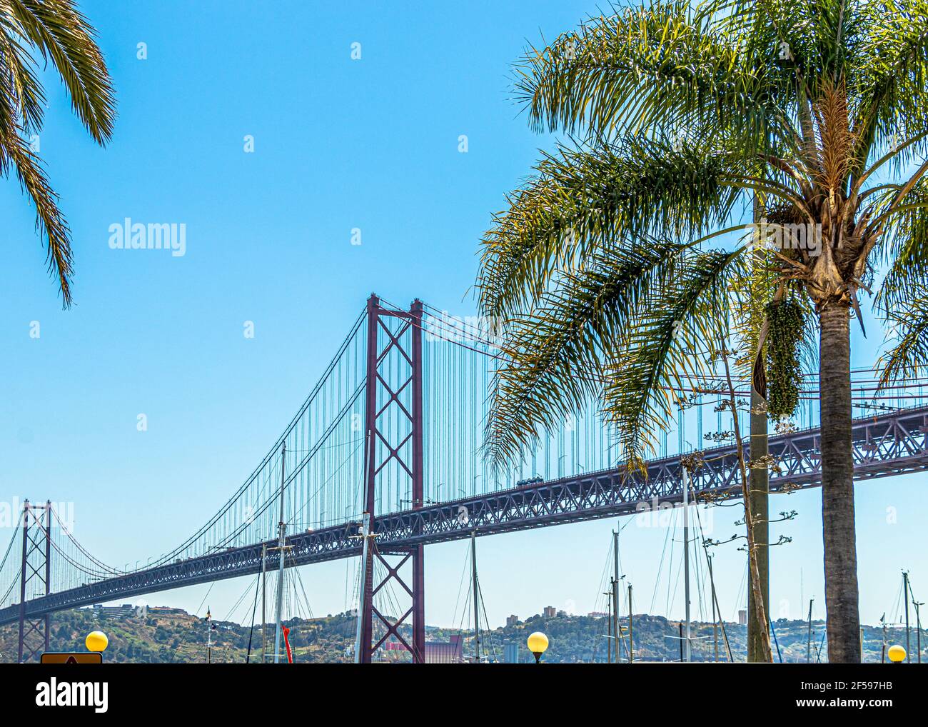 Clear blue sky over the famous 25 de Abril Bridge Lisbon, Portugal with ...