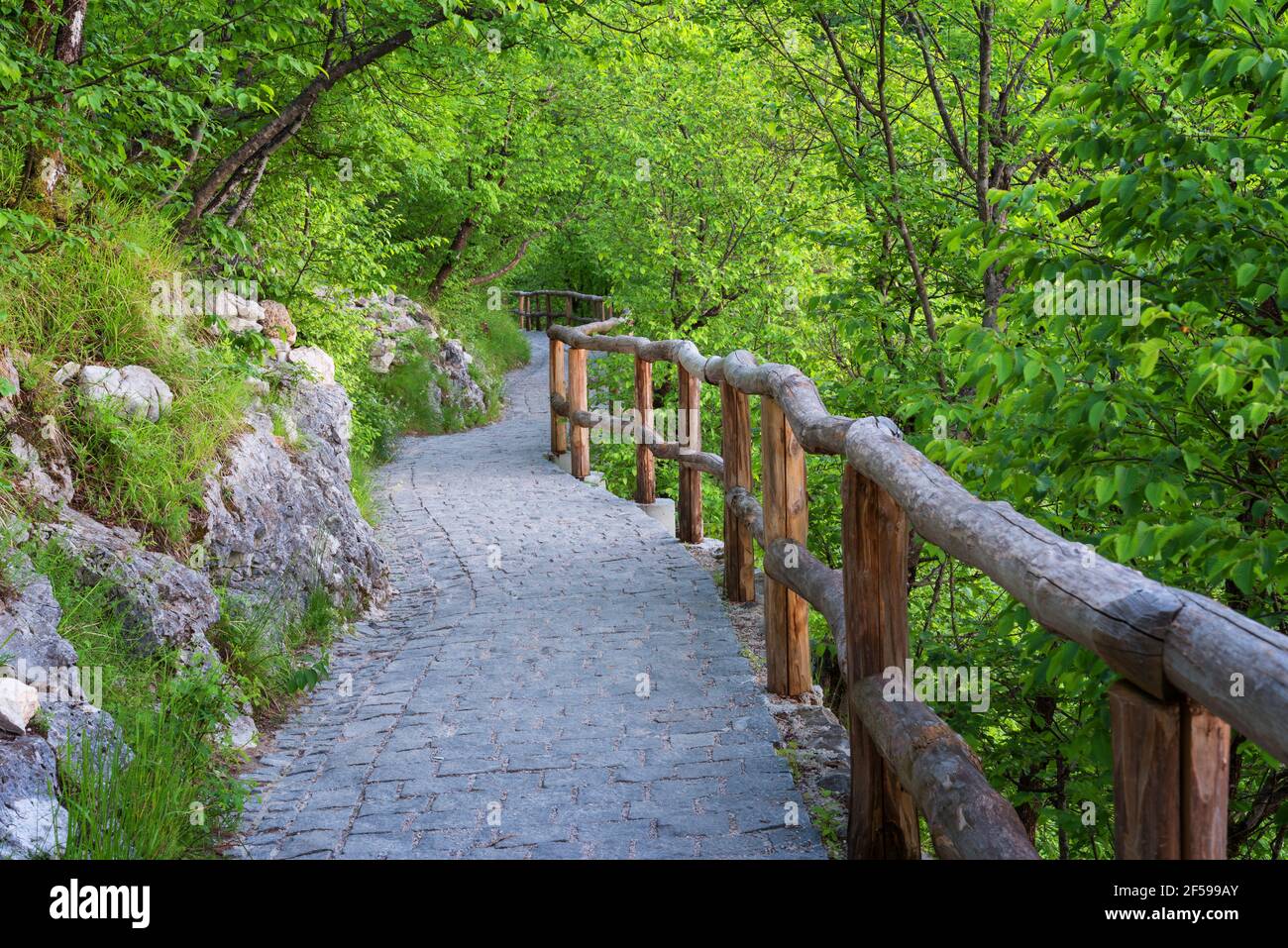 Beautiful view of waterfalls with turquoise water and wooden pathway ...