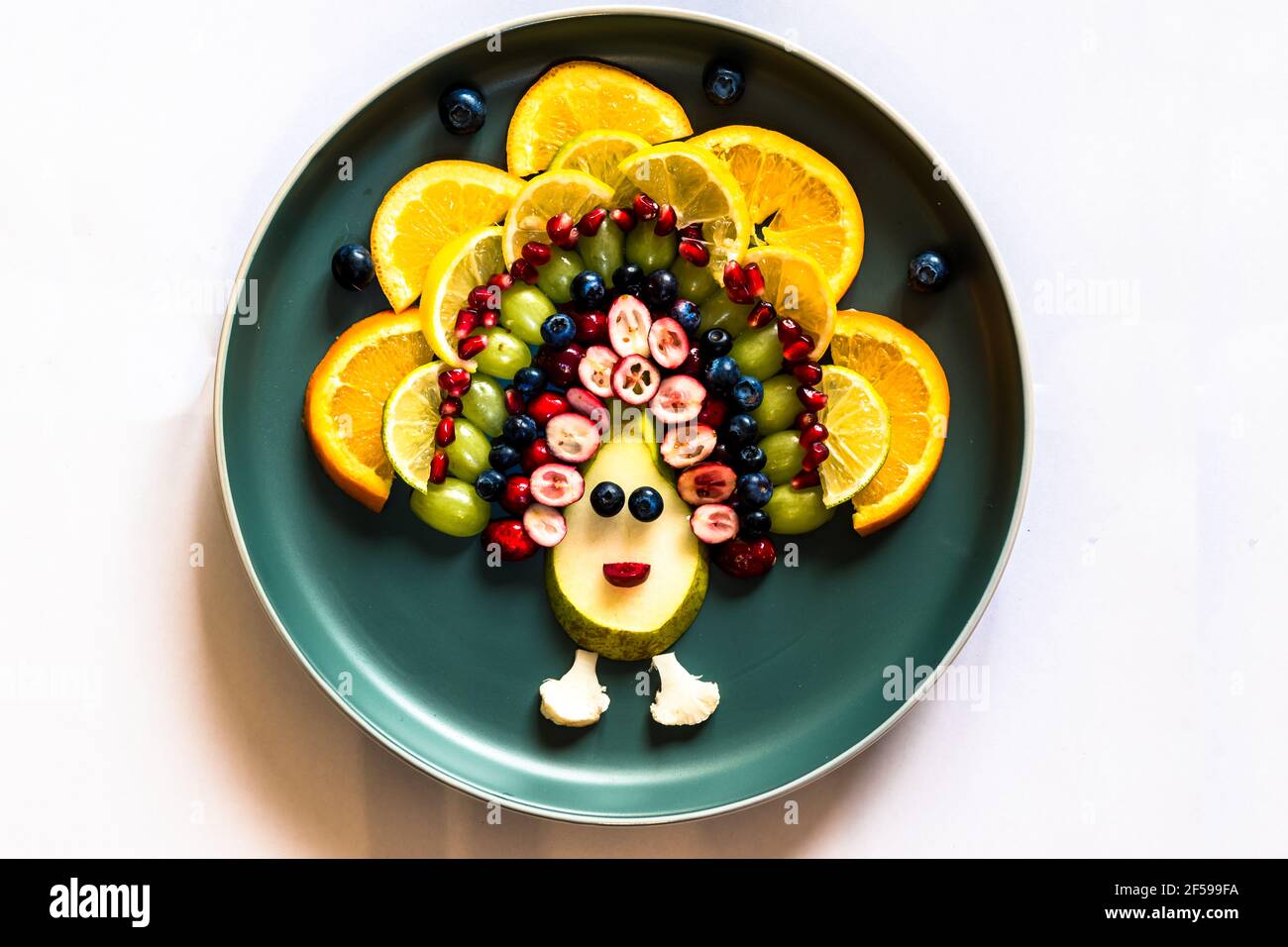 peacock image from fruit and vegetables, copy space Stock Photo - Alamy