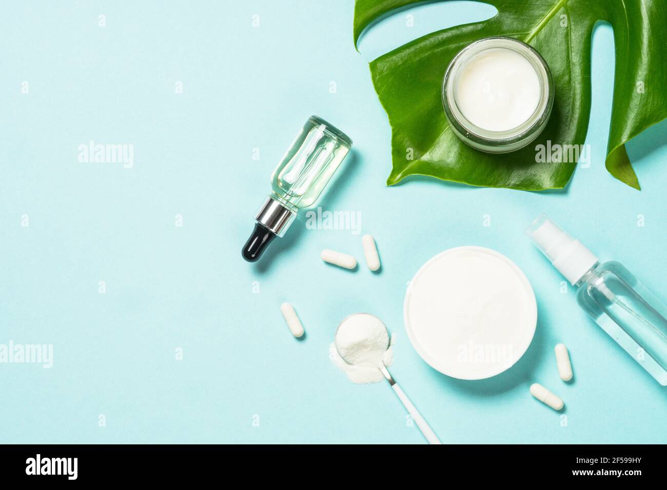 Collagen powder dietary supplement at blue Stock Photo - Alamy