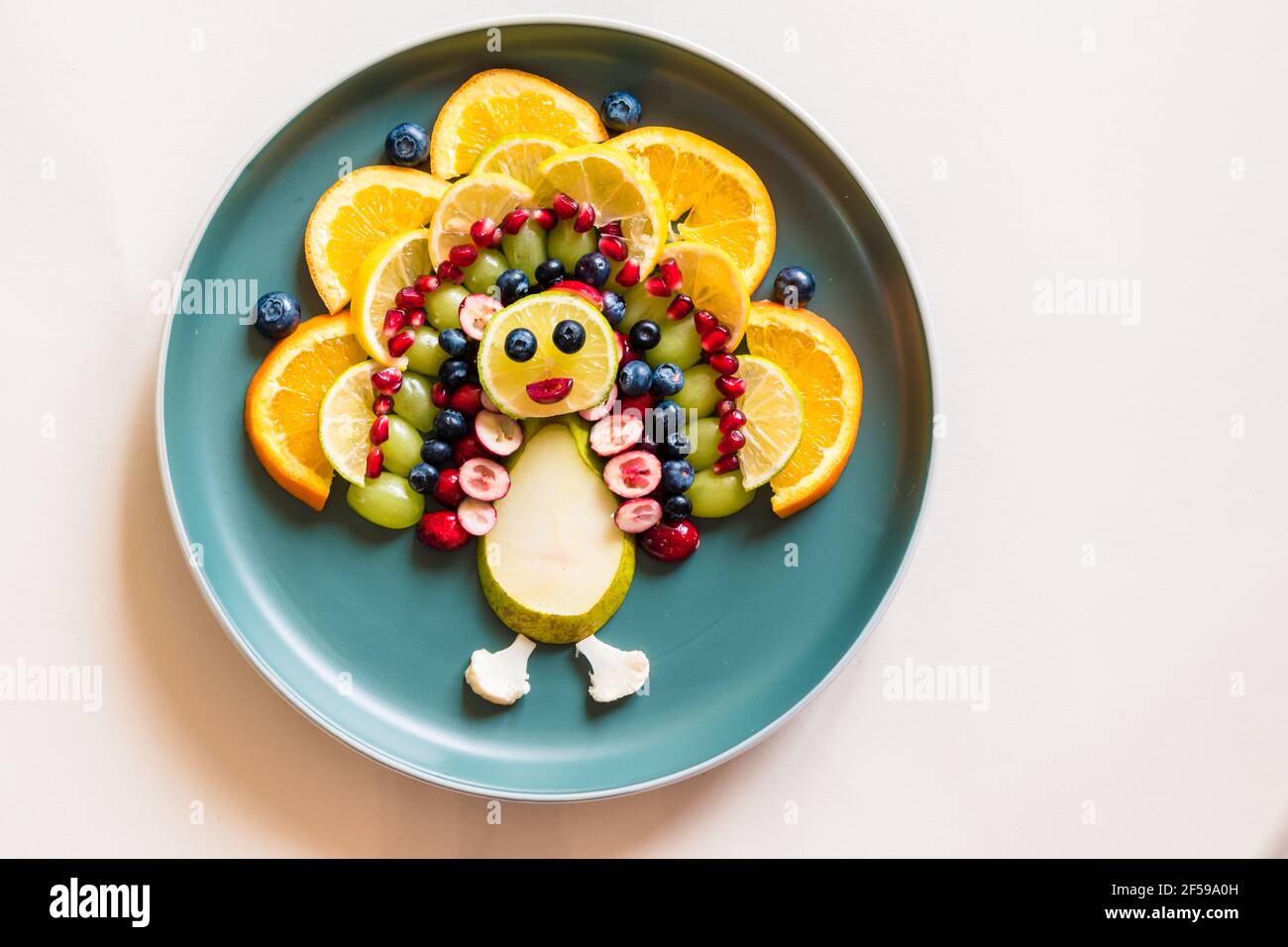 peacock image from fruit and vegetables, copy space Stock Photo - Alamy