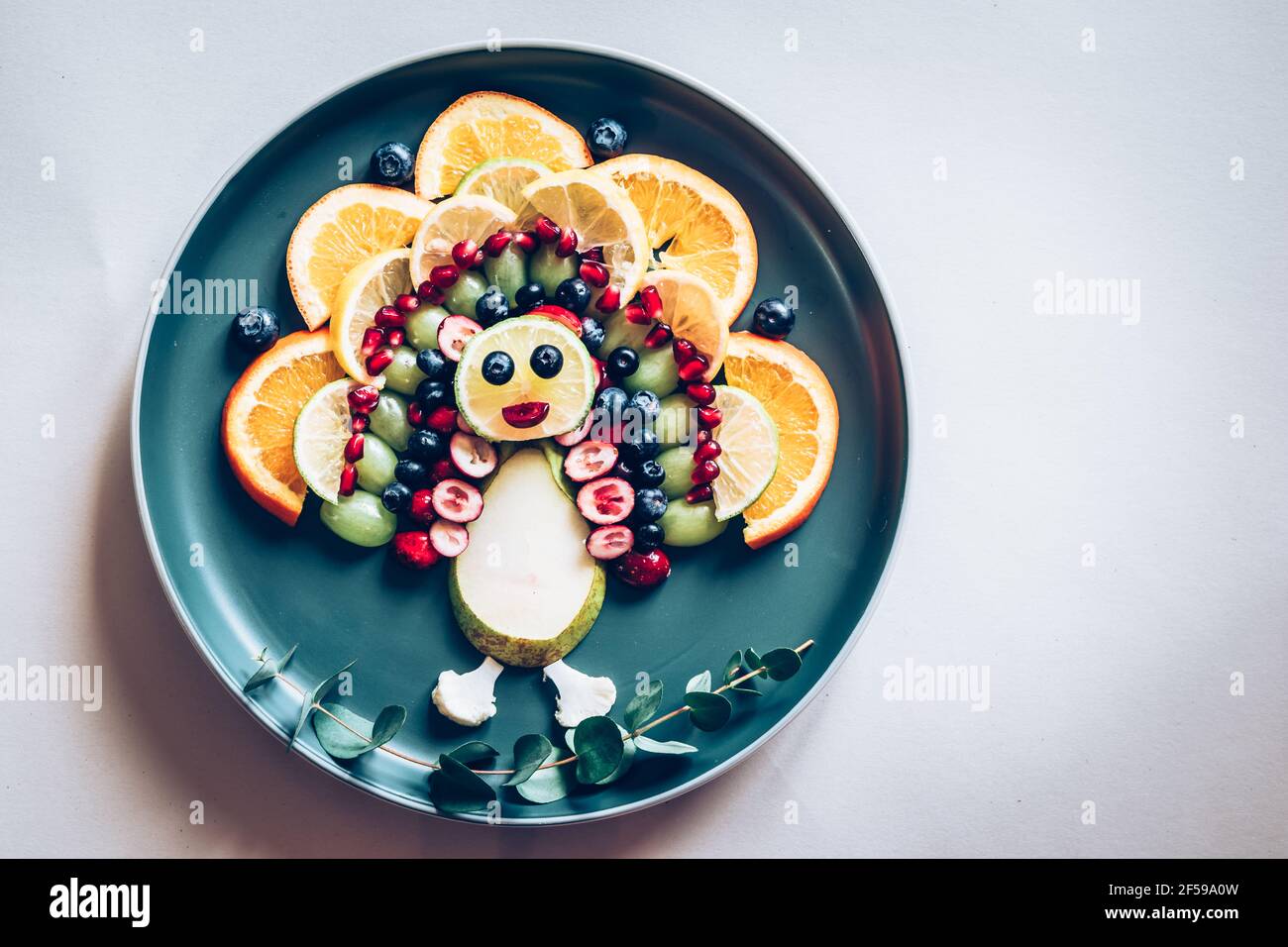 peacock image from fruit and vegetables, copy space Stock Photo - Alamy