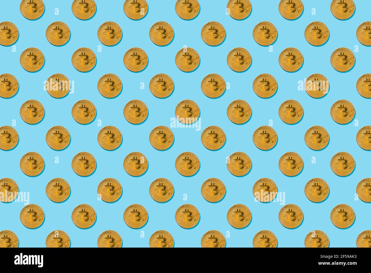 Seamless colorful pattern of Bitcoin currency on blue color background ...