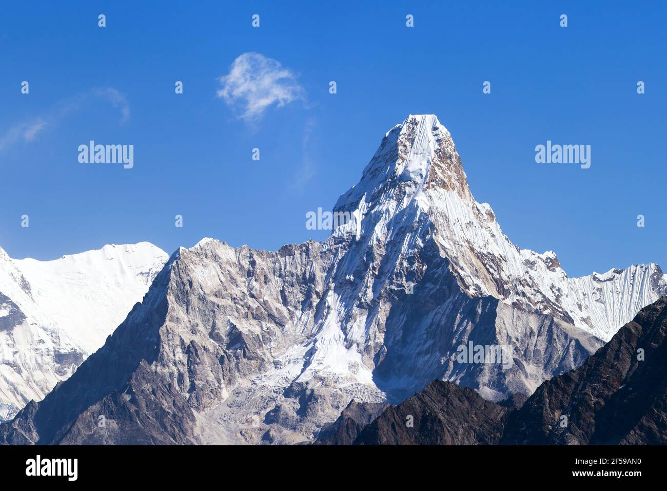 Mount Ama Dablam within clouds, way to Everest base camp, Khumbu valley ...