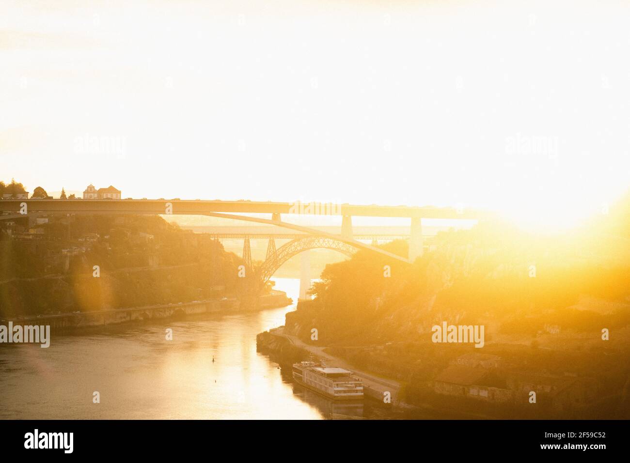 Amazing bright sunrise over on River Douro in Porto, Portugal Stock ...