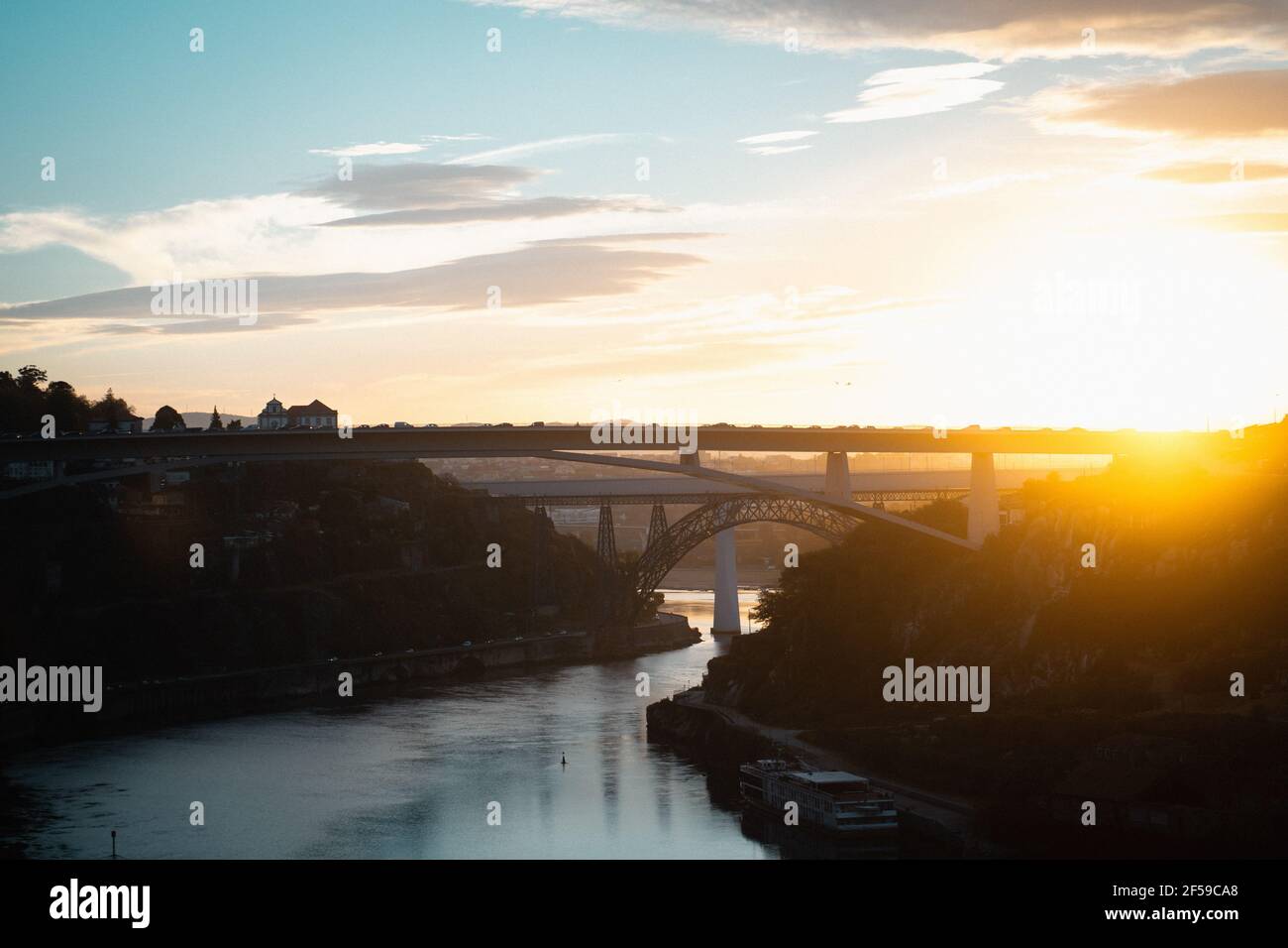 Amazing bright sunrise over on River Douro in Porto, Portugal Stock ...