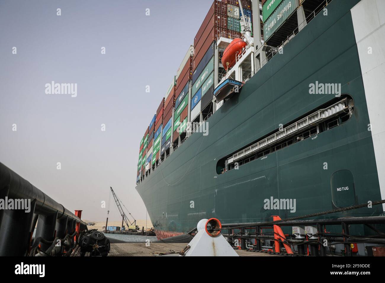 HANDOUT - 25 March 2021, Egypt, Suez: A tugboat takes part in the refloating operation carried ...