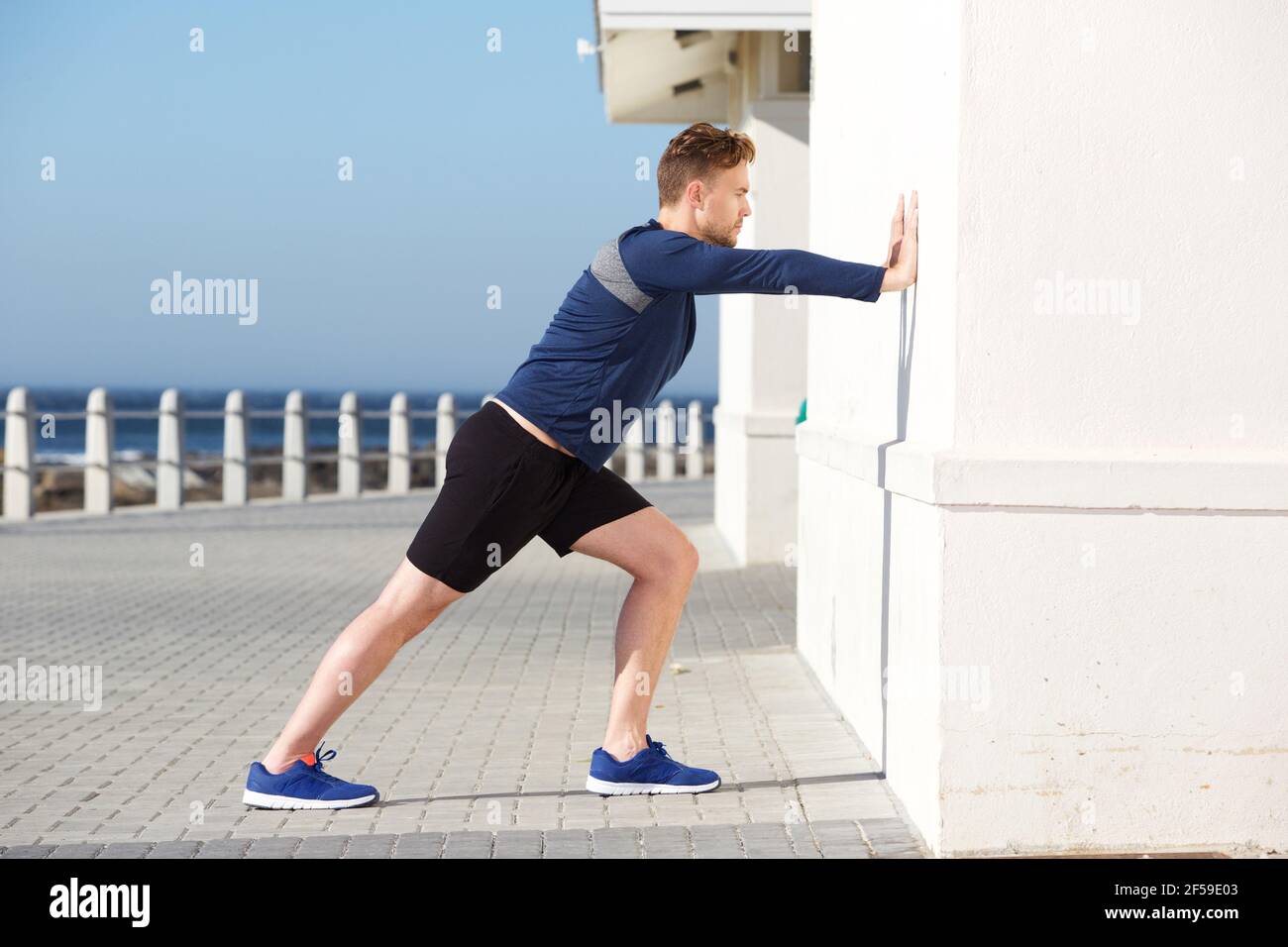 Person pushing against wall hi-res stock photography and images - Alamy