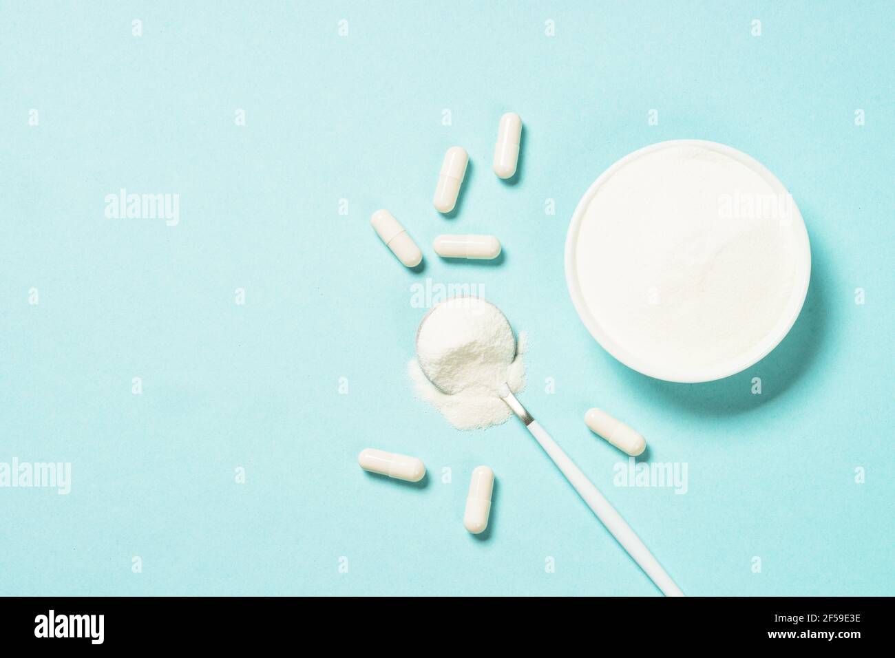 Collagen powder dietary supplement at blue Stock Photo - Alamy