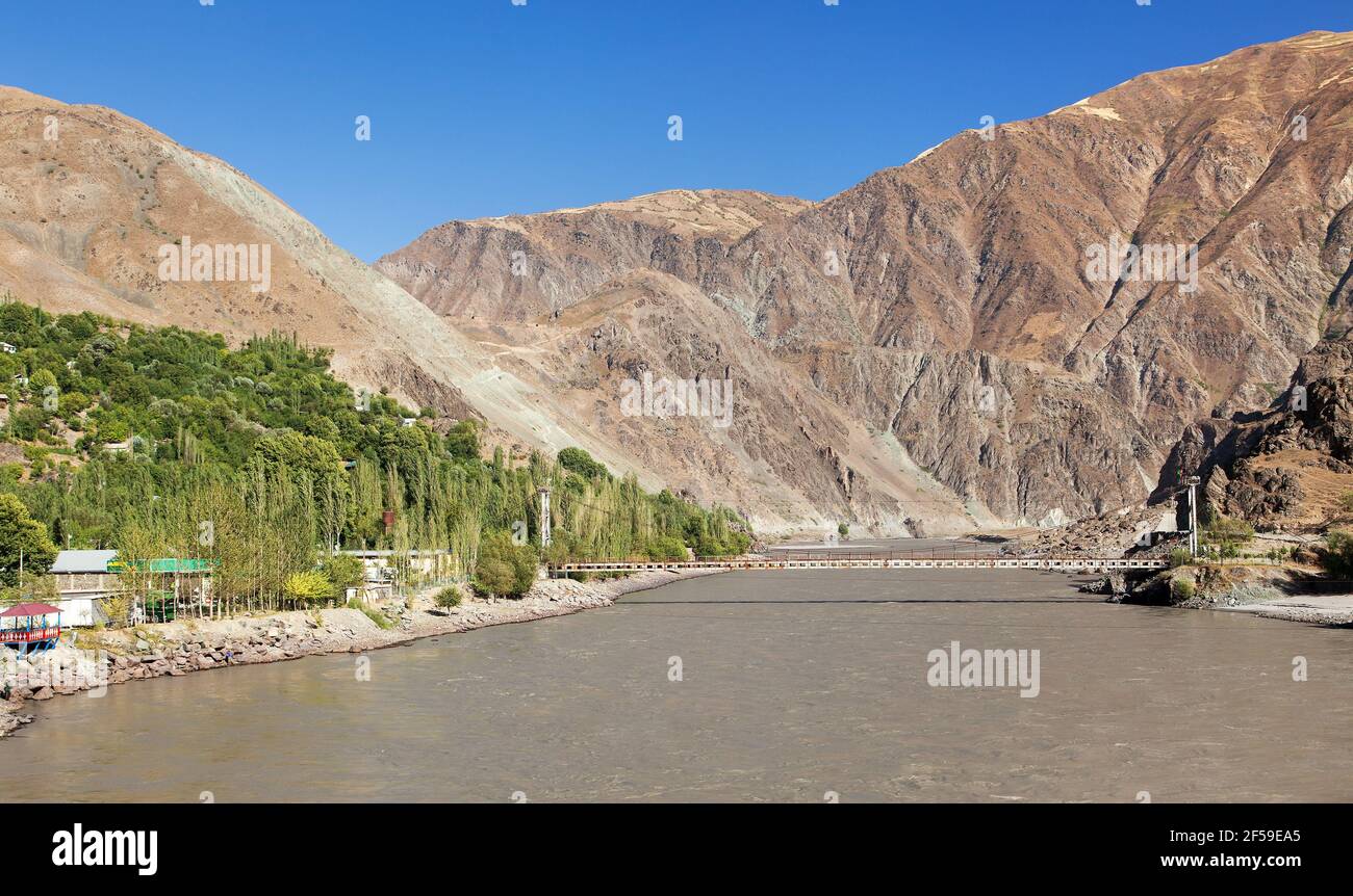 Panj river and Pamir mountains. Panj is upper part of Amu Darya river ...
