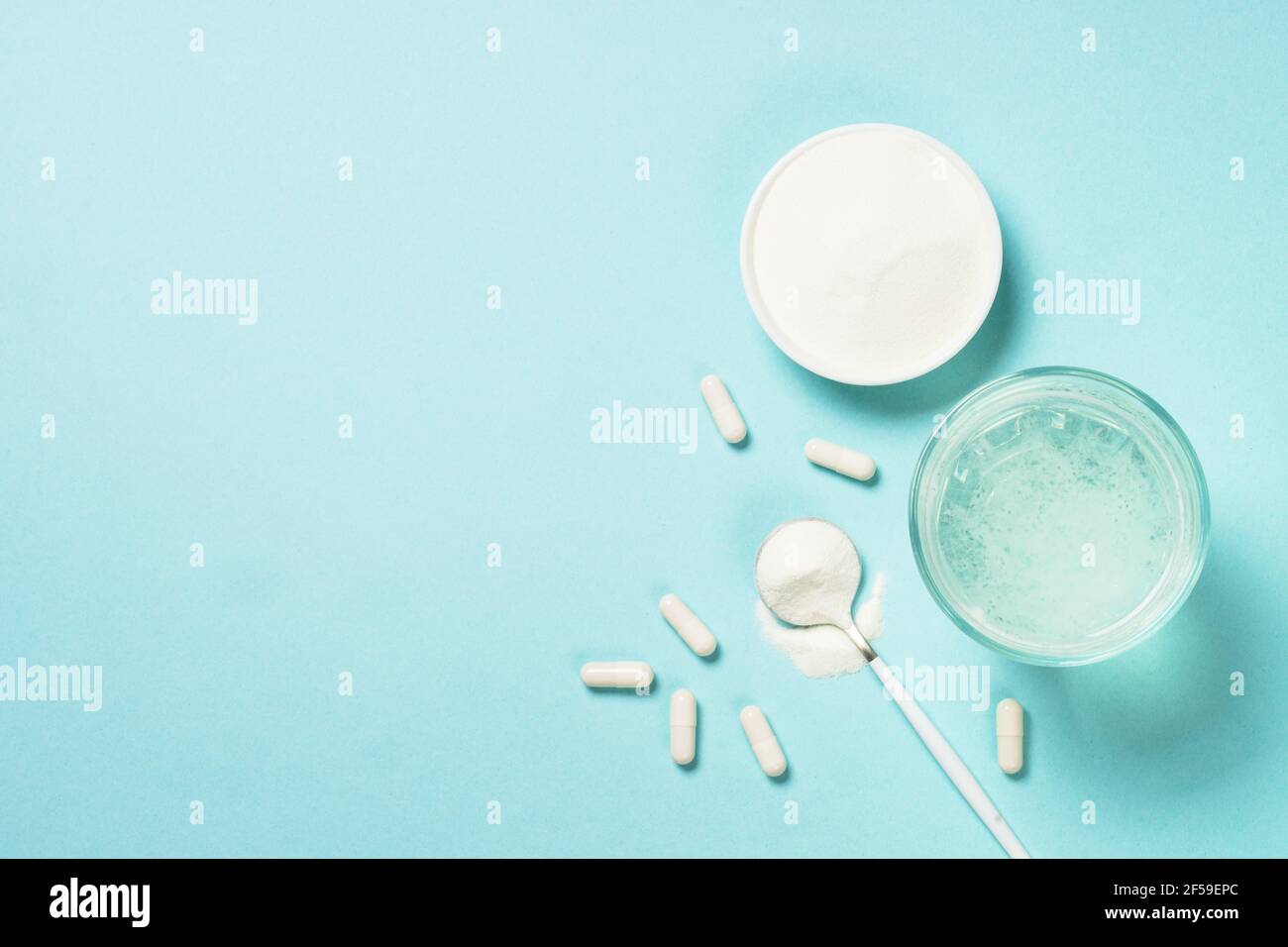 Collagen powder drink, dietary supplement at blue Stock Photo - Alamy