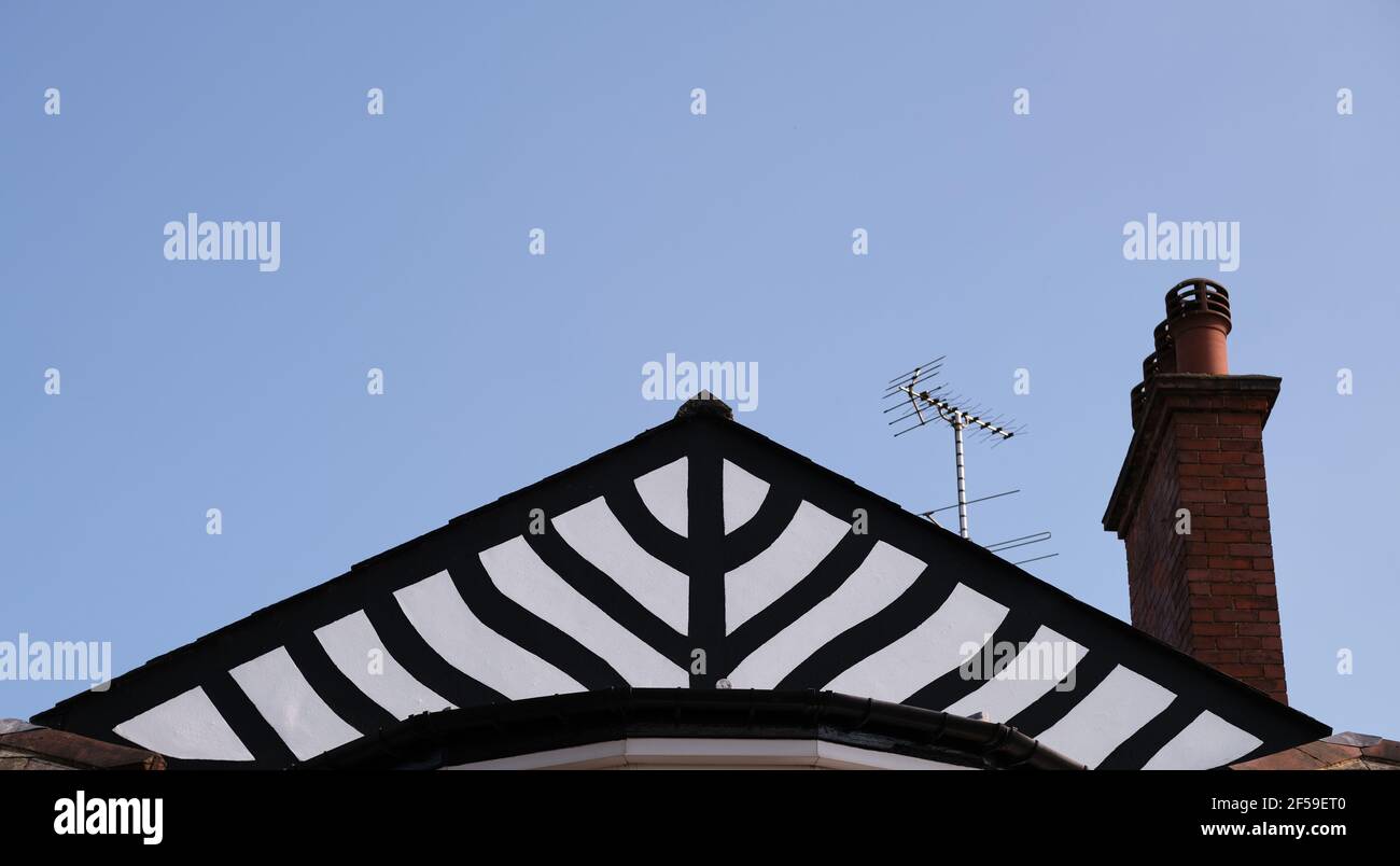 Detail of gable, the triangular section of wall at the end of a pitched ...