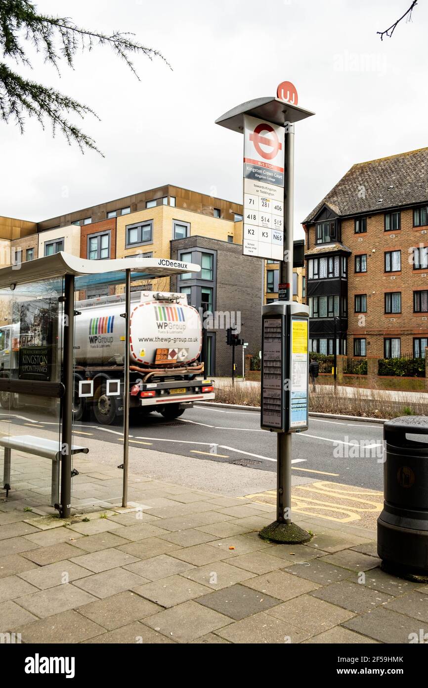 London UK, March 25 2021, Lorry Road Tanker Passing An Empty Bus Stop ...