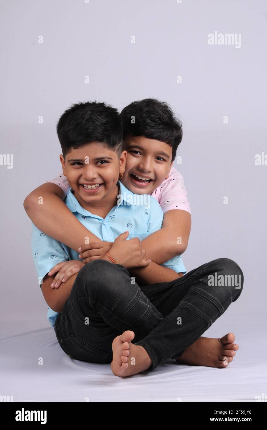 Two brothers hugging portrait hi-res stock photography and images - Alamy