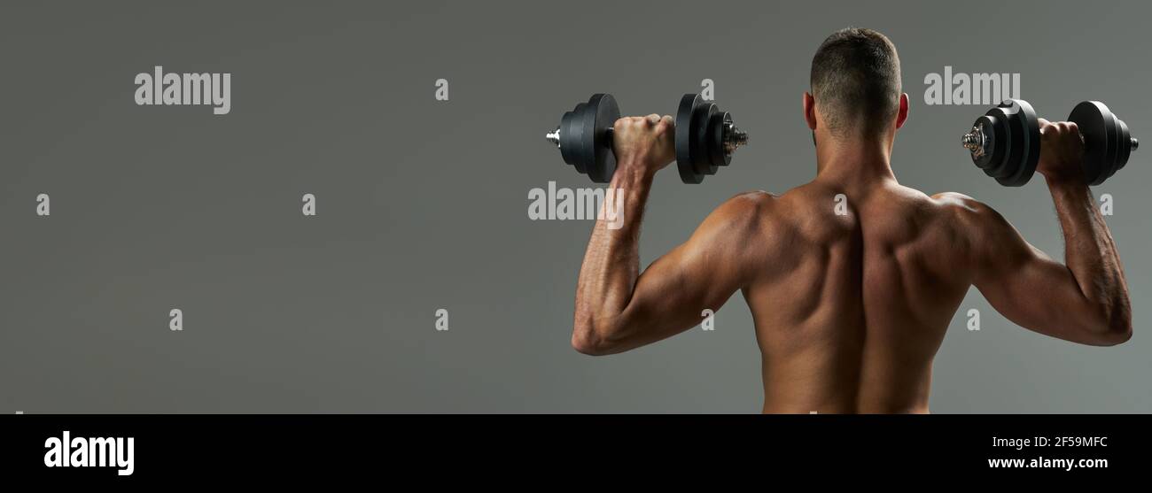 Website header of Adorable strong bodybuilder doing building up muscles ...
