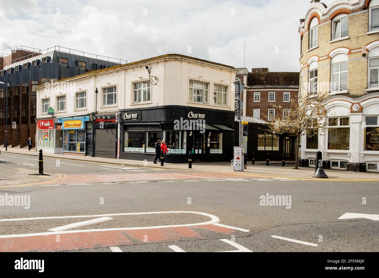 London UK, March 25 2021, Man And Woman Couple Walking Past Closed high ...