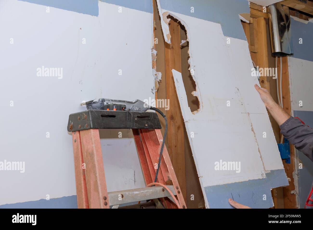 Demolished old plasterboard wall with interior kitchen renovation in ...