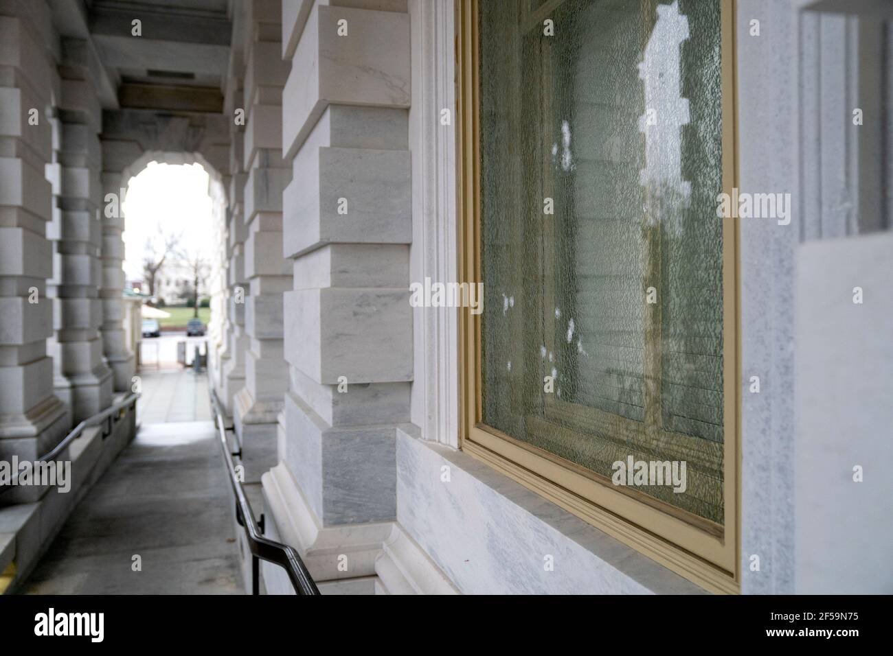 A damaged window at the U.S. Capitol in Washington D.C., U.S. on ...