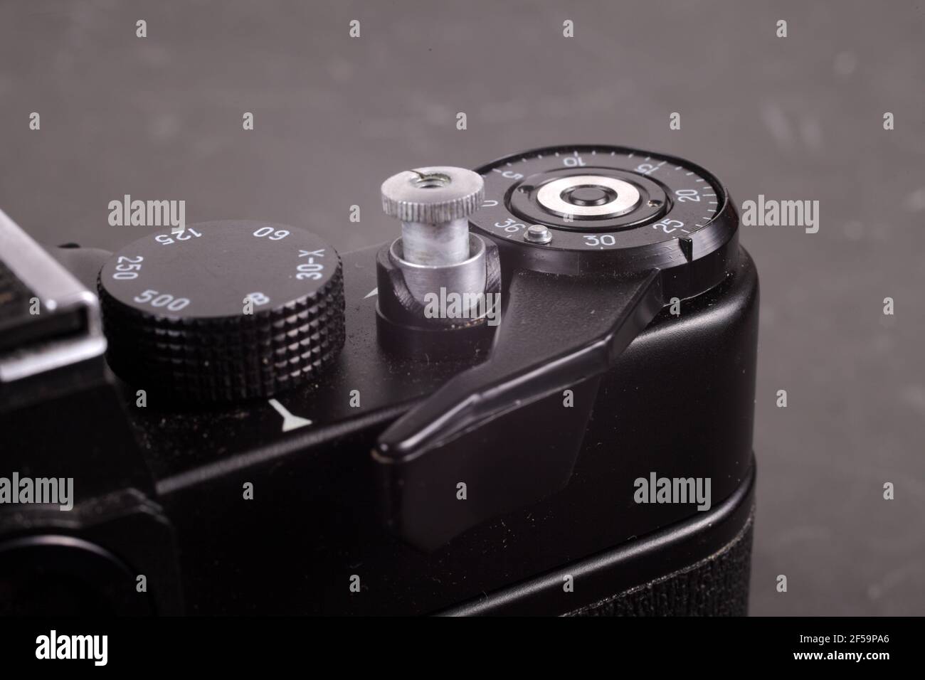 Old film SLR camera, shutter cocking wheel, frame counter and shutter ...