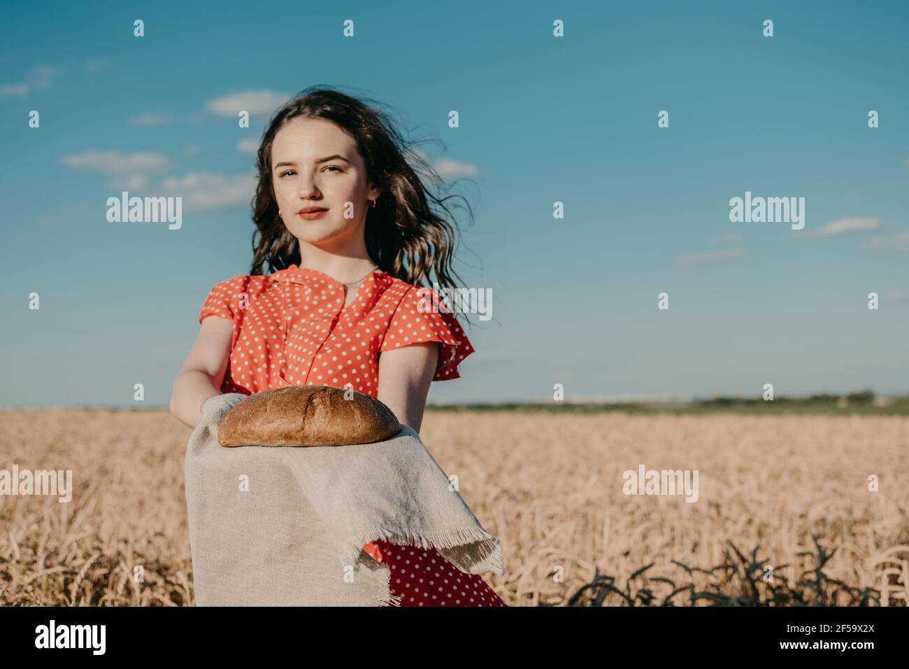 Homemade sourdough Bread Recipe. Homemade Artisan Bread in woman hands ...