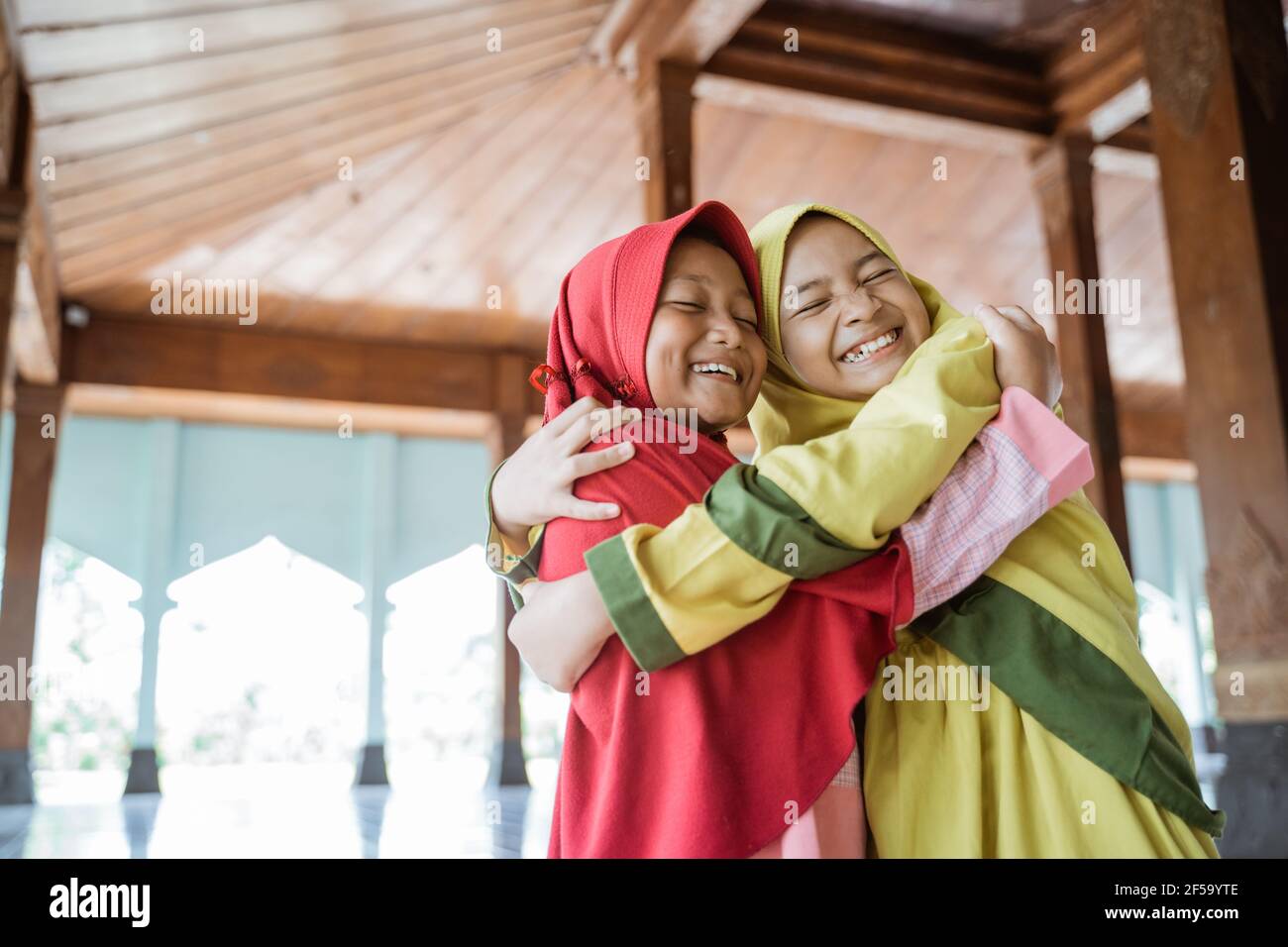 Muslim hug mosque hi-res stock photography and images - Alamy