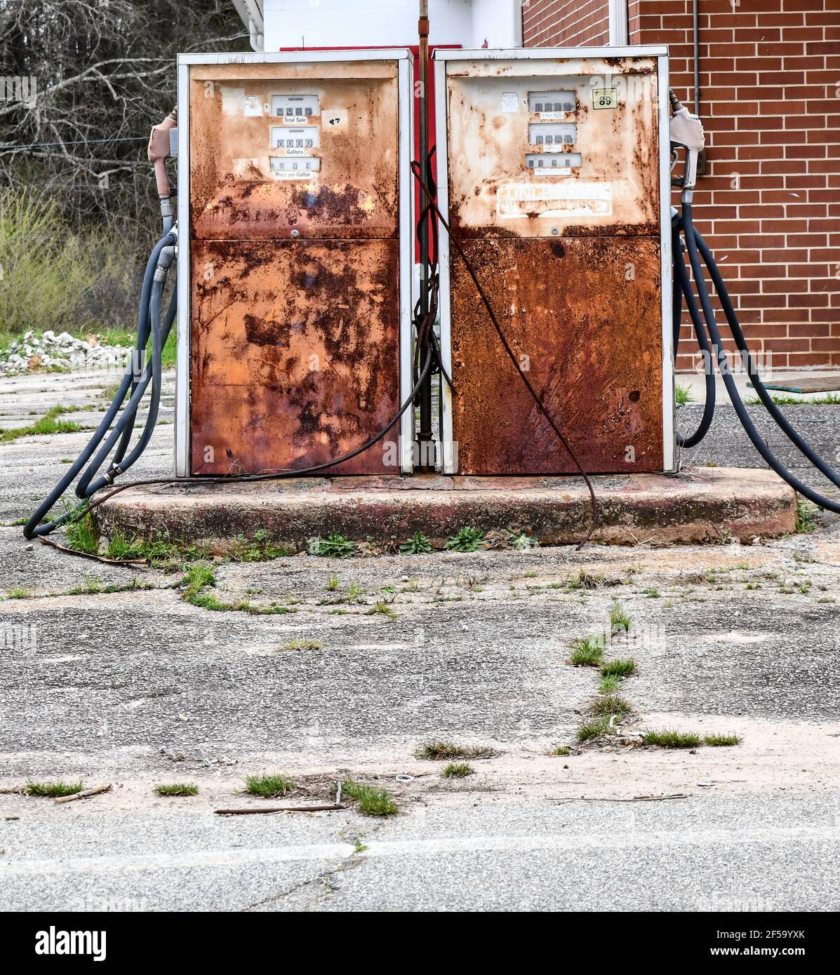 old rusty vintage petroleum fuel pump at abandoned gas station Stock ...