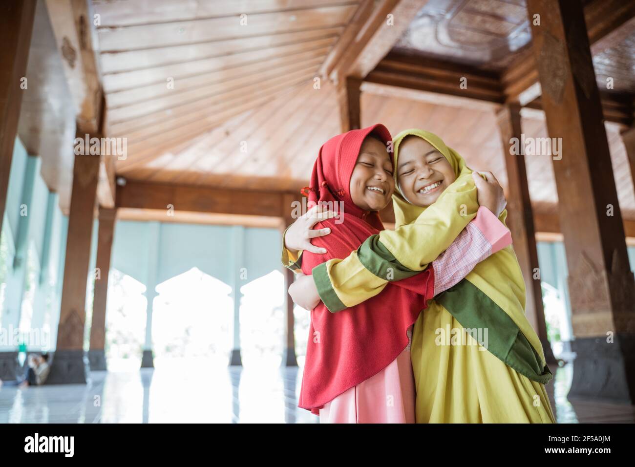 Muslim hug mosque hi-res stock photography and images - Alamy