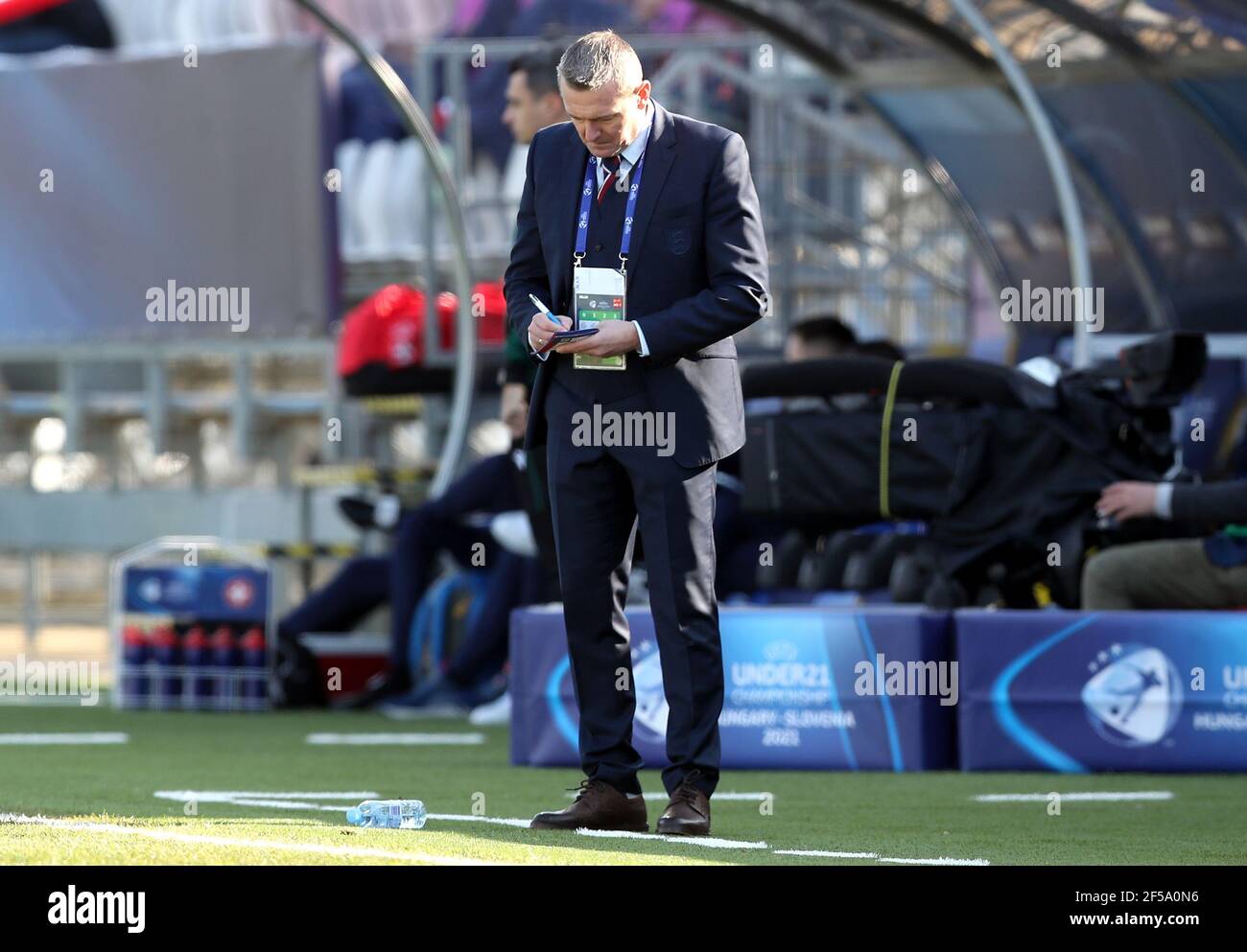 England U21 manager Aidy Boothroyd makes notes during the 2021 UEFA ...
