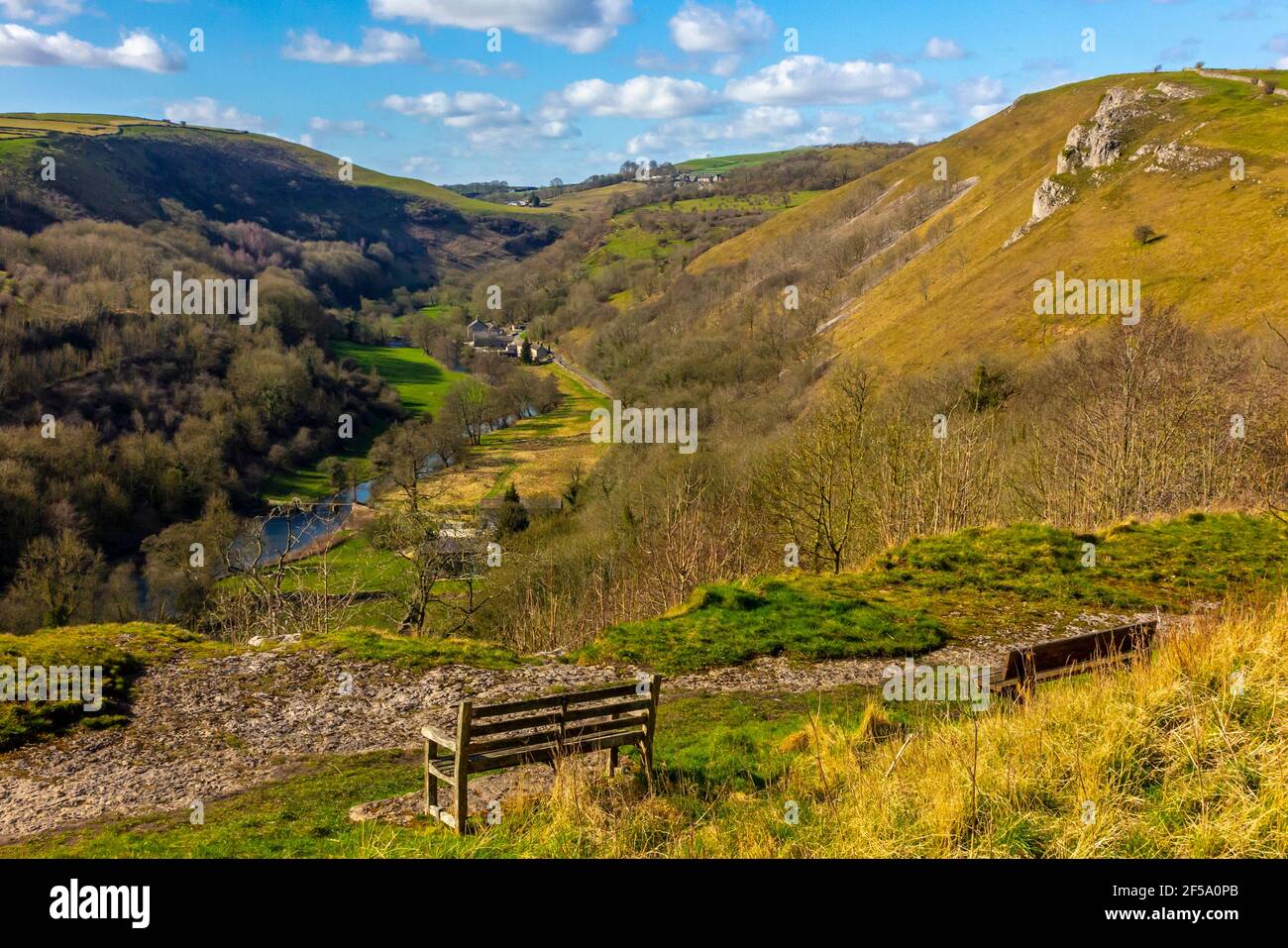 Wooden benches in early spring sunshine at Monsal Head a popular ...