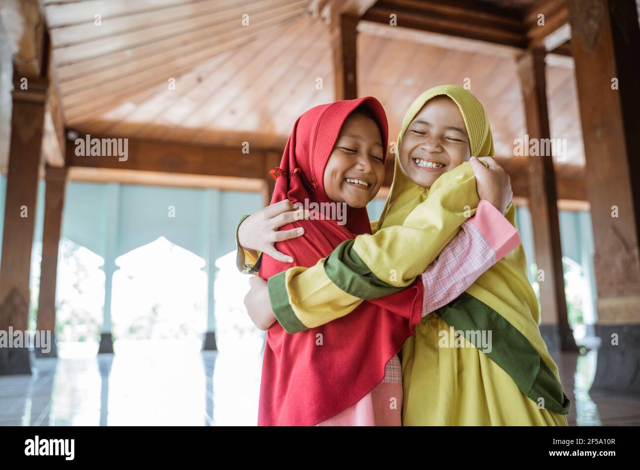 Muslim hug mosque hi-res stock photography and images - Alamy