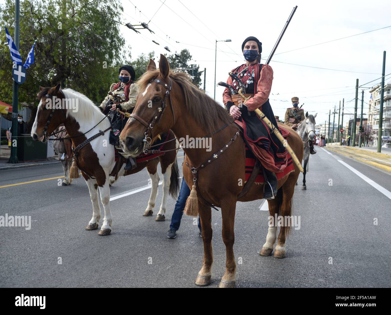 Athens, Greece. 25th Mar, 2021. Female cavalry fighter wearing ...