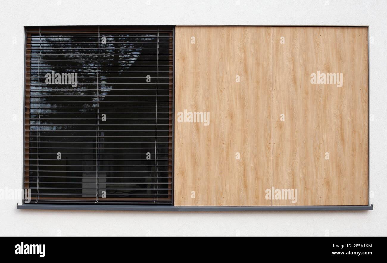 Rectangle-shaped wooden window with blinds in the white wall Stock ...