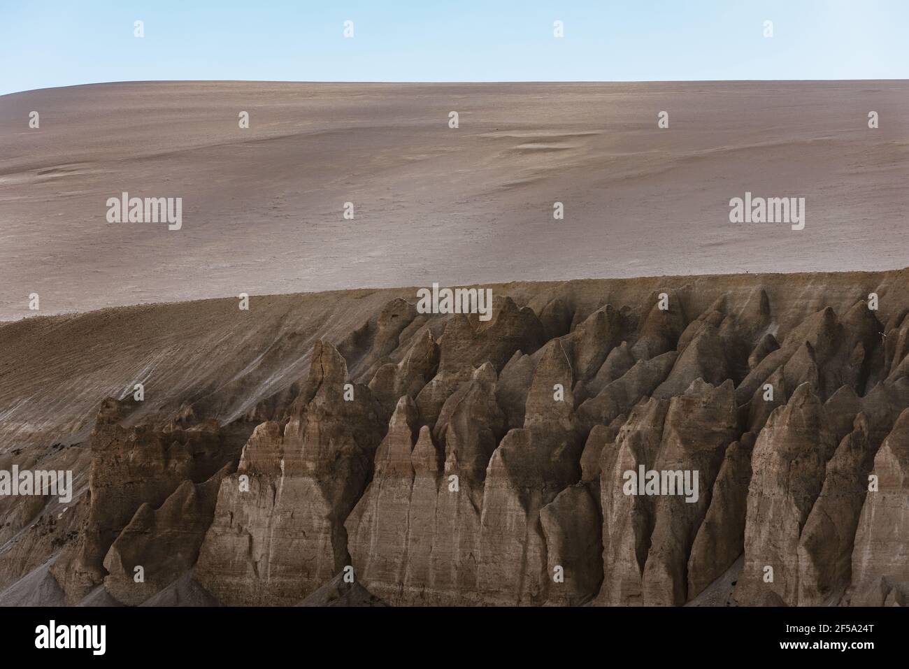 Eroded landscape and rock towers in Tibet Stock Photo - Alamy