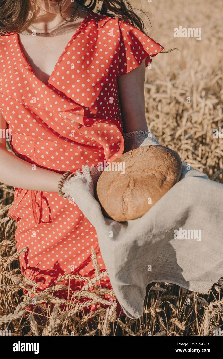 Homemade sourdough Bread Recipe. Homemade Artisan Bread in woman hands ...