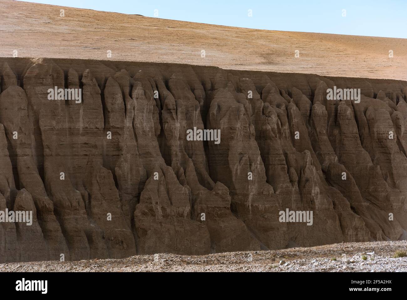 Eroded landscape and rock towers in Tibet Stock Photo - Alamy