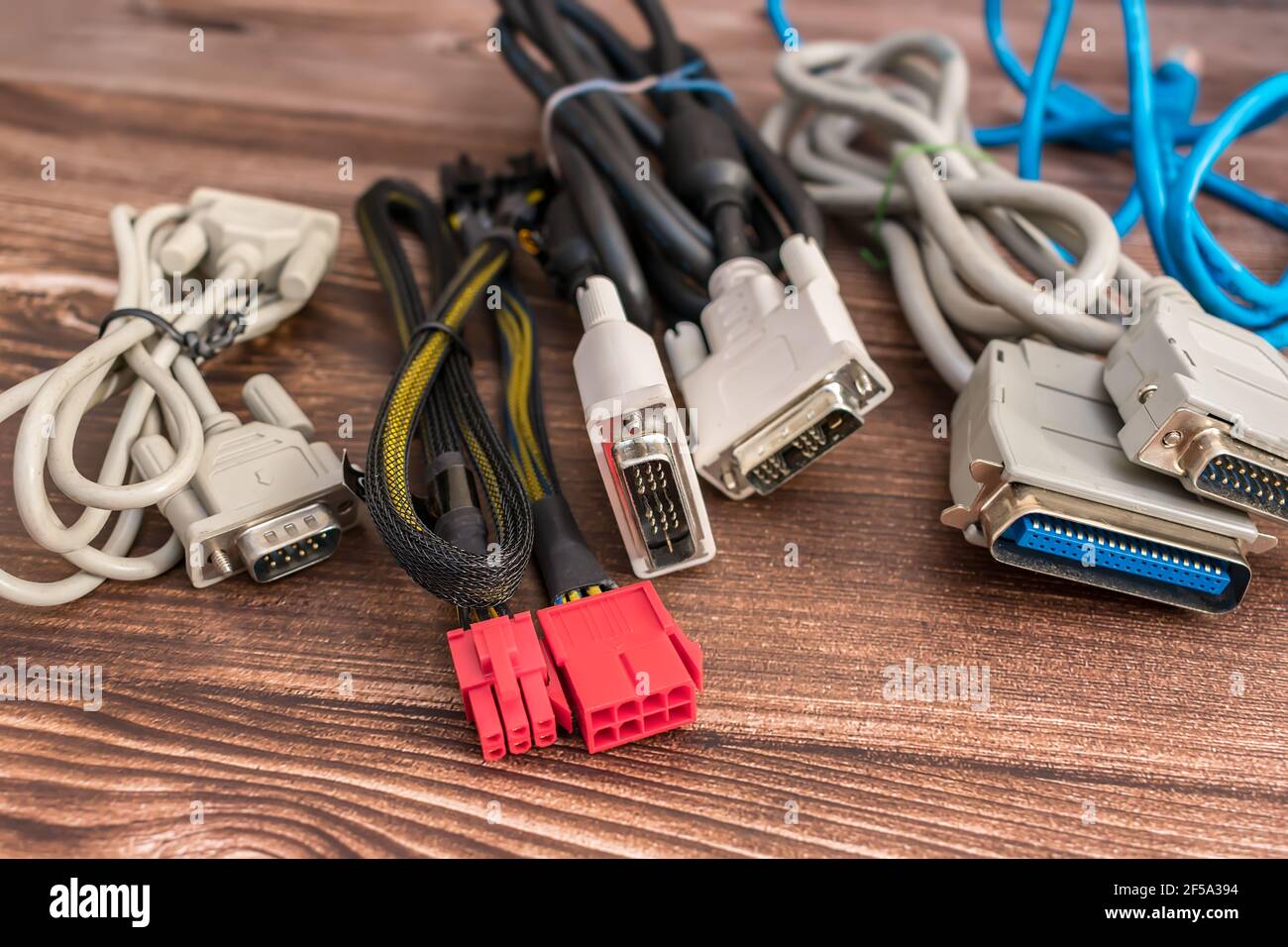 Many different cables and wires for connecting electronic equipment ...