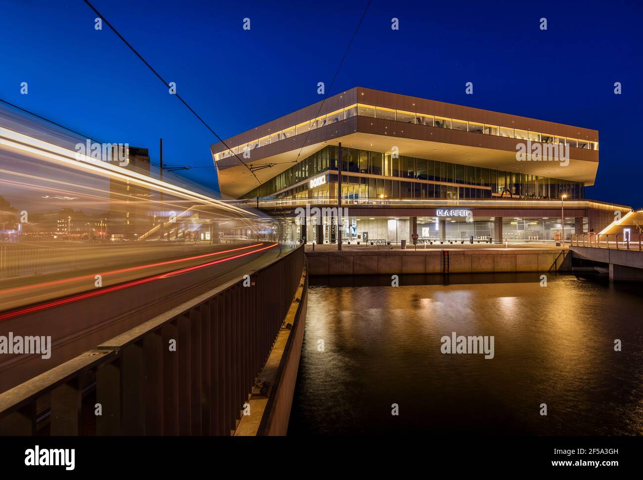 The light rail passing Dokk1 Culture house in Aarhus, Denmark Stock ...
