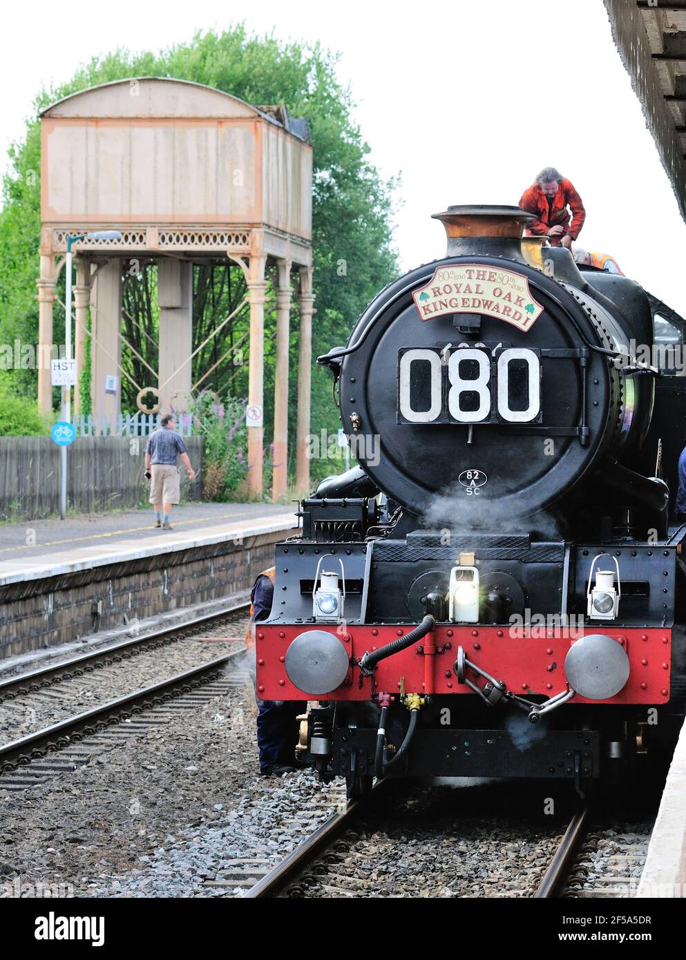 GWR locomotive No 6024 King Edward 1 being serviced during a water stop ...