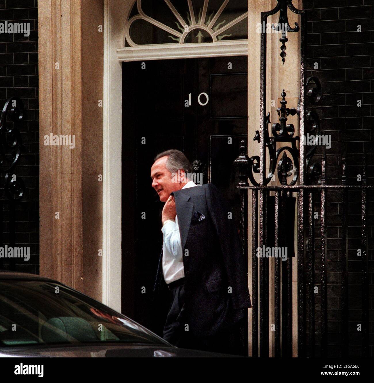 Jack Cunningham smiles as he arrives at No. 10 Downing Street to hear ...